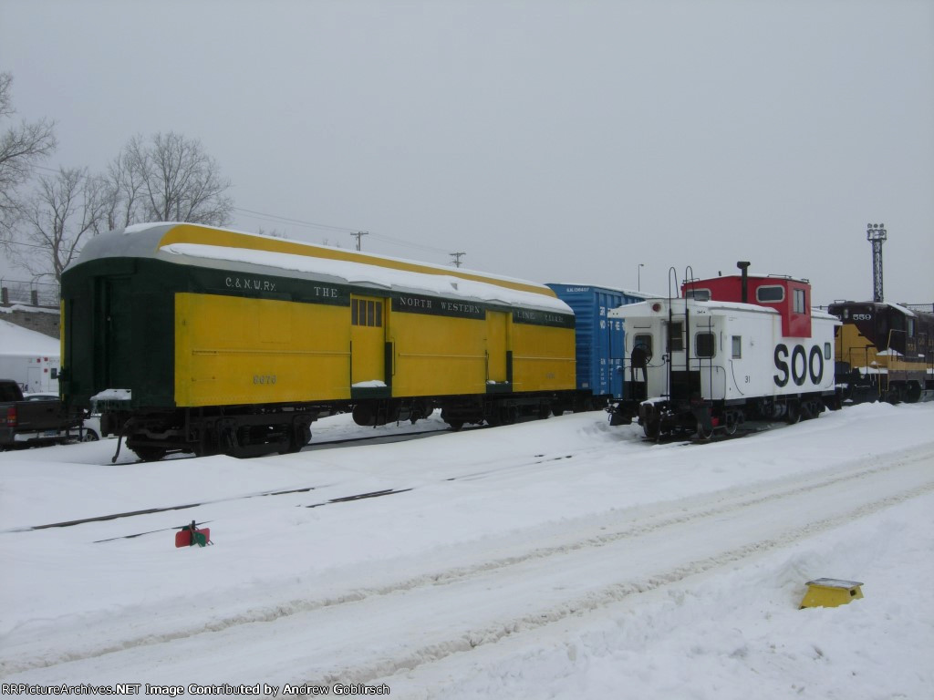 MNTX 559, CNW 8676, GN 138407, and SOO 31 at Jackson Street Roundhouse